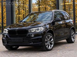 Black BMW X5 2014 in Riga, with an engine capacity of 3.00 L and mileage of 251 thousand km for 18800 €, photo 1 on AUTOMOTO.COM.LV