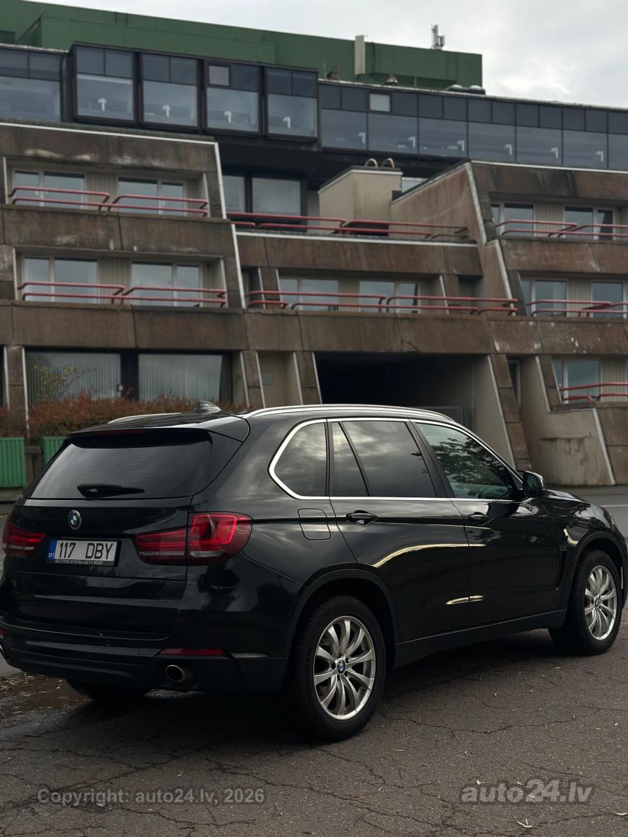 Black BMW X5 2014 in Tallinn, with an engine capacity of 3.00 L and mileage of 208 thousand km for 22500 €, photo 4 on AUTOMOTO.COM.LV