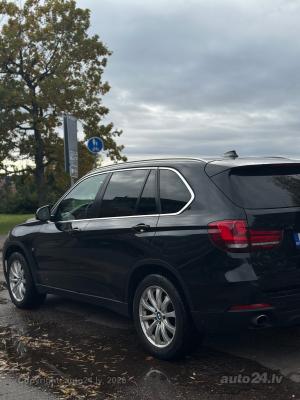 Black BMW X5 2014 in Tallinn, with an engine capacity of 3.00 L and mileage of 208 thousand km for 22500 €, photo 6 on AUTOMOTO.COM.LV