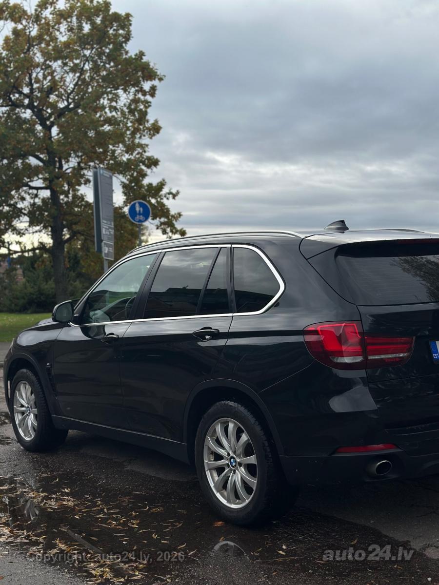 Black BMW X5 2014 in Tallinn, with an engine capacity of 3.00 L and mileage of 208 thousand km for 22500 €, photo 6 on AUTOMOTO.COM.LV