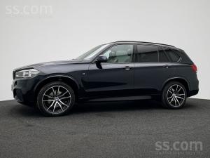 Black BMW X5 2014 in Riga, with an engine capacity of 3.00 L and mileage of 296 thousand km for 21900 €, photo 4 on AUTOMOTO.COM.LV