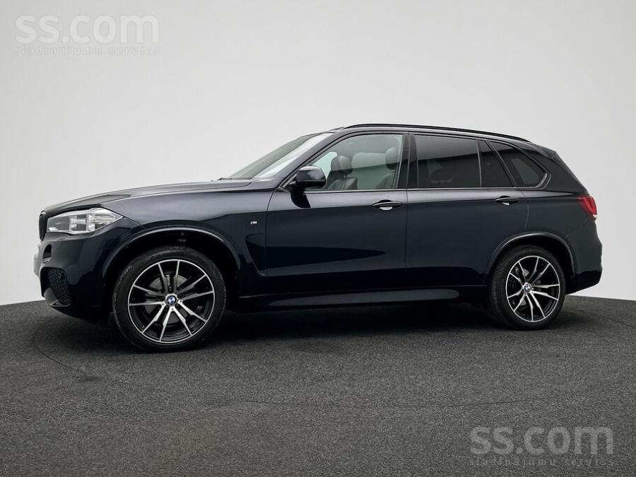 Black BMW X5 2014 in Riga, with an engine capacity of 3.00 L and mileage of 296 thousand km for 21900 €, photo 4 on AUTOMOTO.COM.LV