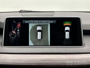 Black BMW X5 2014 in Riga, with an engine capacity of 3.00 L and mileage of 296 thousand km for 21900 €, photo 11 on AUTOMOTO.COM.LV