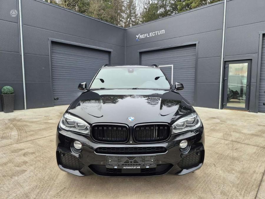 Black BMW X5 2015 in Utena, with an engine capacity of 2.99 L and mileage of 242 thousand km for 21990 €, photo 7 on AUTOMOTO.COM.LV