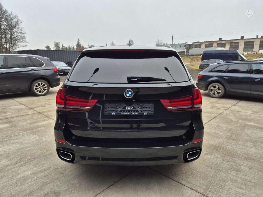 Black BMW X5 2015 in Utena, with an engine capacity of 2.99 L and mileage of 242 thousand km for 21990 €, photo 8 on AUTOMOTO.COM.LV