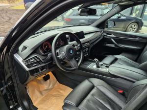 Black BMW X5 2015 in Utena, with an engine capacity of 2.99 L and mileage of 242 thousand km for 21990 €, photo 9 on AUTOMOTO.COM.LV