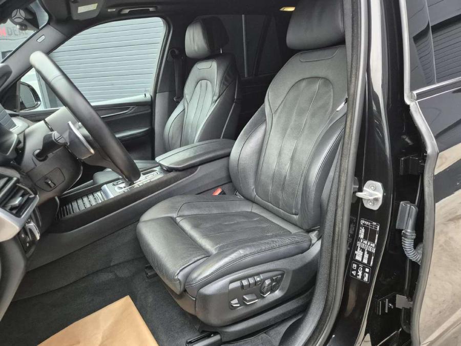 Black BMW X5 2015 in Utena, with an engine capacity of 2.99 L and mileage of 242 thousand km for 21990 €, photo 12 on AUTOMOTO.COM.LV