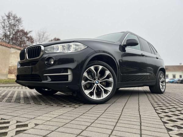 Black BMW X5 2015 in Kaunas, with an engine capacity of 2.00 L and mileage of 198 thousand km for 15800 €, photo 1 on AUTOMOTO.COM.LV