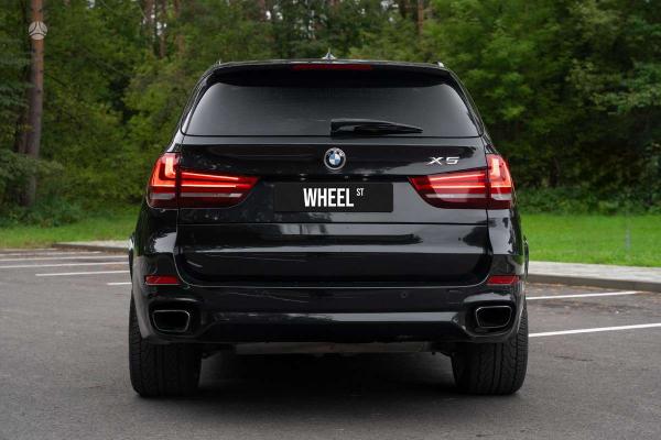 Black BMW X5 2015 in Vilnius, with an engine capacity of 4.40 L and mileage of 129 thousand km for 21500 €, photo 6 on AUTOMOTO.COM.LV