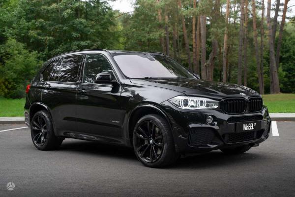 Black BMW X5 2015 in Vilnius, with an engine capacity of 4.40 L and mileage of 129 thousand km for 21500 €, photo 9 on AUTOMOTO.COM.LV