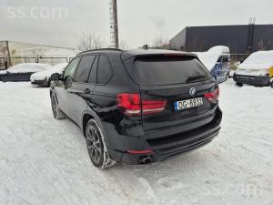 Black BMW X5 2015 in Riga, with an engine capacity of 3.00 L and mileage of 370 thousand km for 19690 €, photo 7 on AUTOMOTO.COM.LV