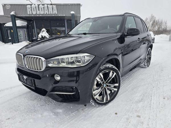Black BMW X5 2015 in Pakruojis, with an engine capacity of 2.99 L and mileage of 250 thousand km for 13700 €, photo 1 on AUTOMOTO.COM.LV