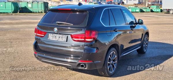 Black BMW X5 2015 in Tartu, with an engine capacity of 3.00 L and mileage of 223 thousand km for 20990 €, photo 5 on AUTOMOTO.COM.LV