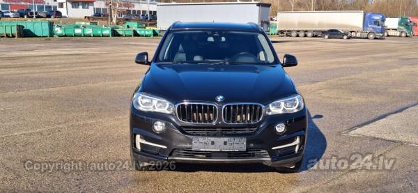 Black BMW X5 2015 in Tartu, with an engine capacity of 3.00 L and mileage of 223 thousand km for 20990 €, photo 6 on AUTOMOTO.COM.LV