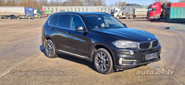 Black BMW X5 2015 in Tartu, with an engine capacity of 3.00 L and mileage of 223 thousand km for 20990 €, photo 7 on AUTOMOTO.COM.LV