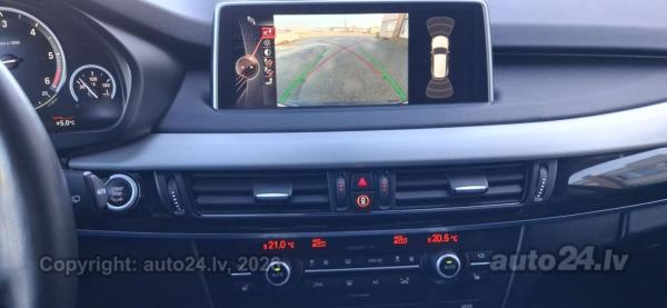 Black BMW X5 2015 in Tartu, with an engine capacity of 3.00 L and mileage of 223 thousand km for 20990 €, photo 11 on AUTOMOTO.COM.LV