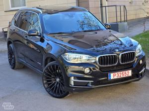 Black BMW X5 2015 in Radviliskis, with an engine capacity of 5.00 L and mileage of 114 thousand km for 9800 €, photo 12 on AUTOMOTO.COM.LV