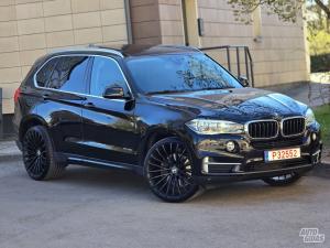 Black BMW X5 2015 in Radviliskis, with an engine capacity of 5.00 L and mileage of 114 thousand km for 9800 €, photo 14 on AUTOMOTO.COM.LV