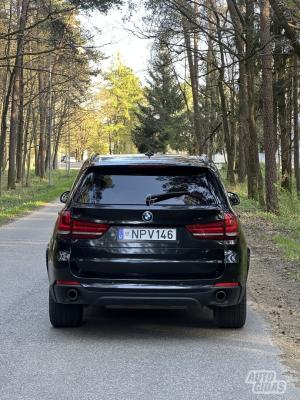 Black BMW X5 2015 in Vilnius, with an engine capacity of 3.00 L and mileage of 237 thousand km for 14700 €, photo 6 on AUTOMOTO.COM.LV
