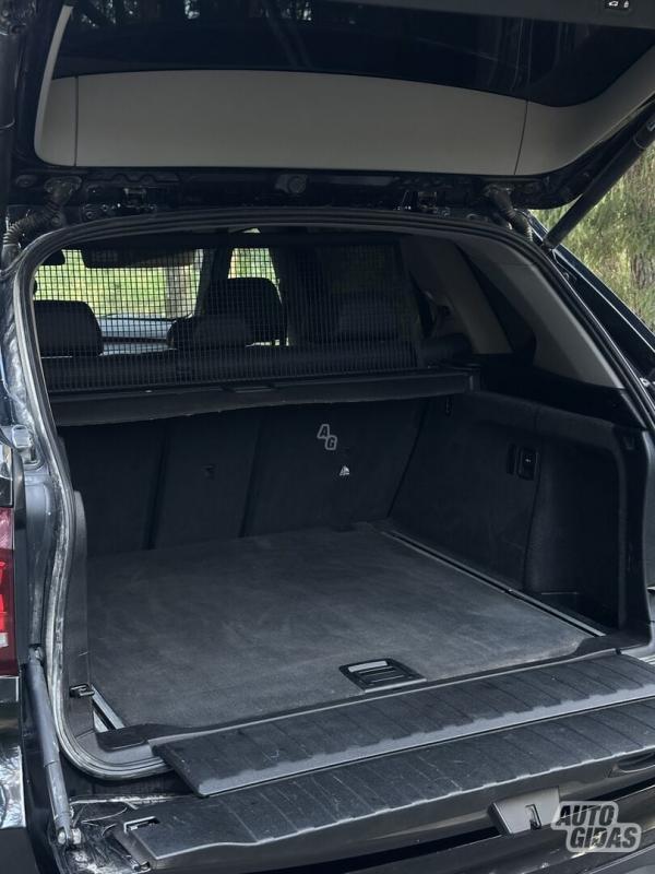 Black BMW X5 2015 in Vilnius, with an engine capacity of 3.00 L and mileage of 237 thousand km for 14700 €, photo 9 on AUTOMOTO.COM.LV