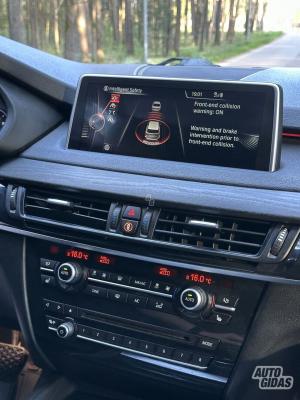 Black BMW X5 2015 in Vilnius, with an engine capacity of 3.00 L and mileage of 237 thousand km for 14700 €, photo 17 on AUTOMOTO.COM.LV