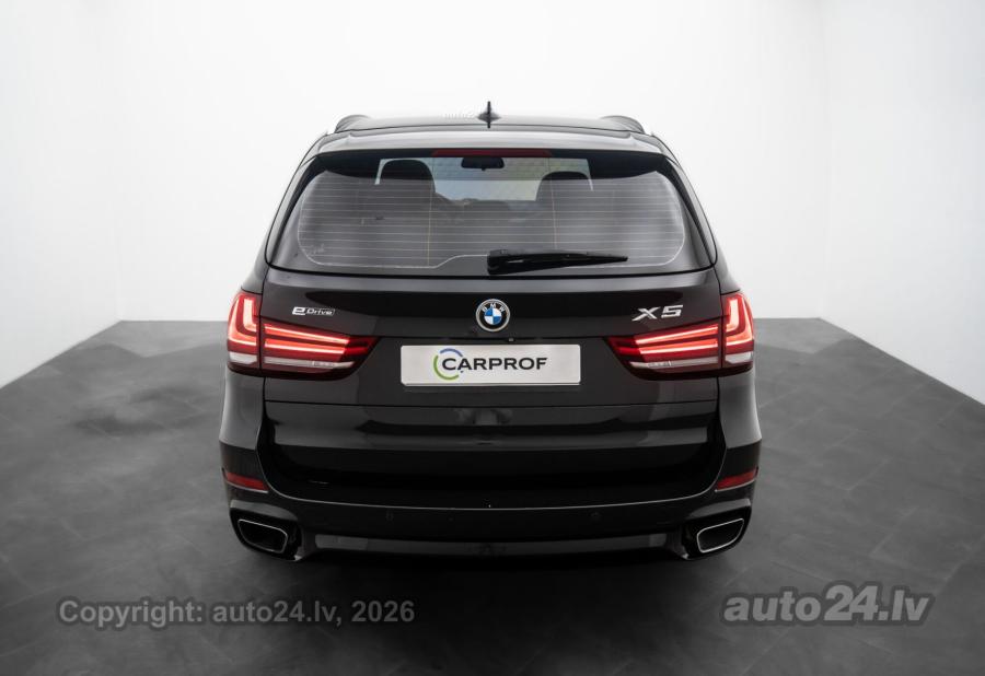 Black BMW X5 2015 in Tallinn, with an engine capacity of 2.00 L and mileage of 129 thousand km for 24999 €, photo 6 on AUTOMOTO.COM.LV