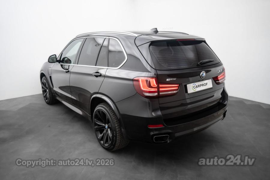 Black BMW X5 2015 in Tallinn, with an engine capacity of 2.00 L and mileage of 129 thousand km for 24999 €, photo 7 on AUTOMOTO.COM.LV