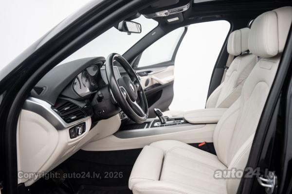Black BMW X5 2015 in Tallinn, with an engine capacity of 2.00 L and mileage of 129 thousand km for 24999 €, photo 7 on AUTOMOTO.COM.LV