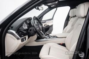 Black BMW X5 2015 in Tallinn, with an engine capacity of 2.00 L and mileage of 129 thousand km for 24999 €, photo 8 on AUTOMOTO.COM.LV