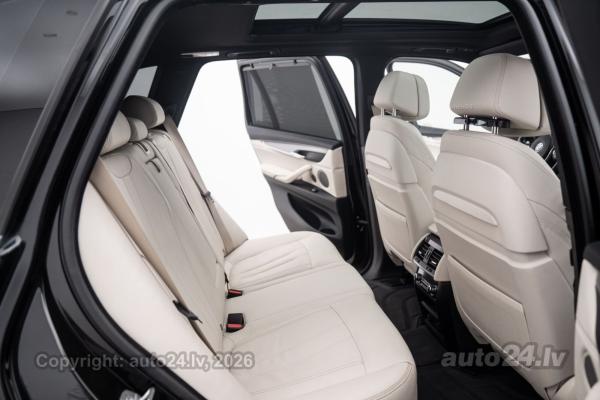 Black BMW X5 2015 in Tallinn, with an engine capacity of 2.00 L and mileage of 129 thousand km for 24999 €, photo 9 on AUTOMOTO.COM.LV