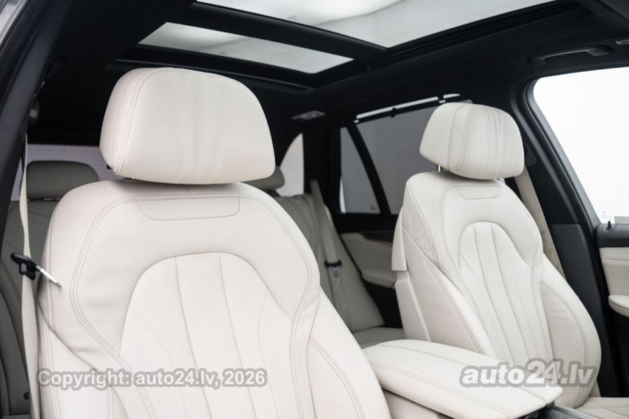 Black BMW X5 2015 in Tallinn, with an engine capacity of 2.00 L and mileage of 129 thousand km for 24999 €, photo 14 on AUTOMOTO.COM.LV
