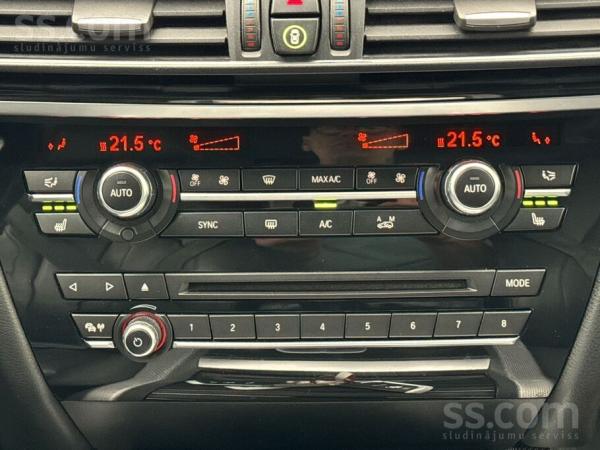 Black BMW X5 2015 in Riga, with an engine capacity of 3.00 L and mileage of 188 thousand km for 27600 €, photo 9 on AUTOMOTO.COM.LV
