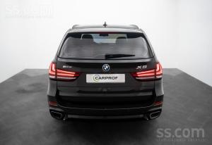Black BMW X5 2015 in Riga, with an engine capacity of 2.00 L and mileage of 129 thousand km for 22499 €, photo 6 on AUTOMOTO.COM.LV