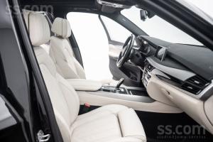 Black BMW X5 2015 in Riga, with an engine capacity of 2.00 L and mileage of 129 thousand km for 22499 €, photo 11 on AUTOMOTO.COM.LV