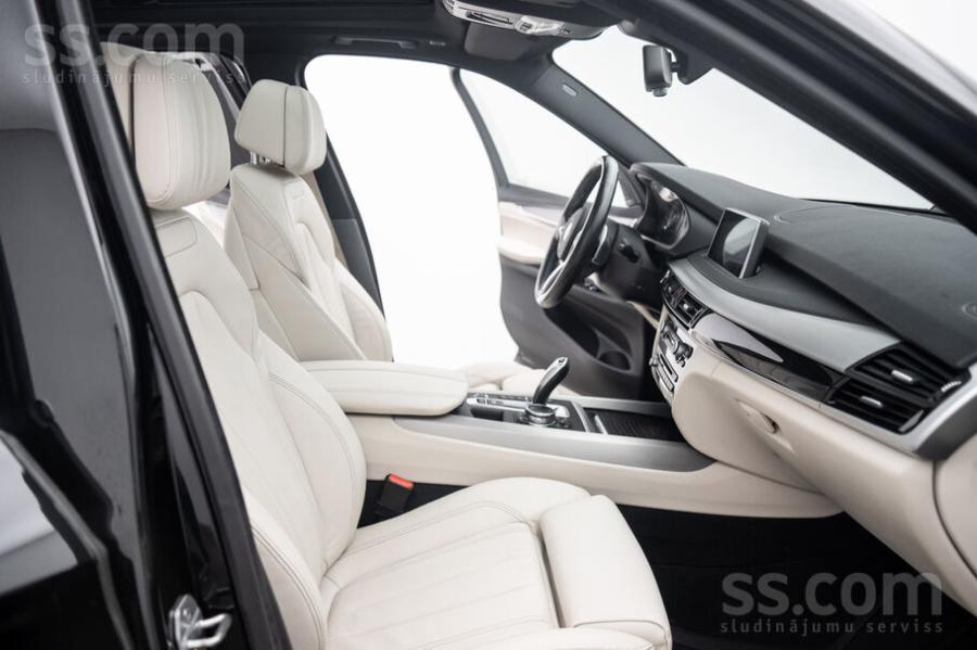 Black BMW X5 2015 in Riga, with an engine capacity of 2.00 L and mileage of 129 thousand km for 22499 €, photo 11 on AUTOMOTO.COM.LV