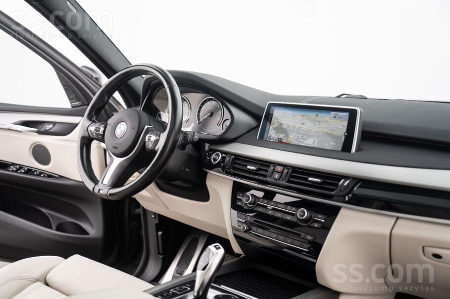 Black BMW X5 2015 in Riga, with an engine capacity of 2.00 L and mileage of 129 thousand km for 22499 €, photo 12 on AUTOMOTO.COM.LV
