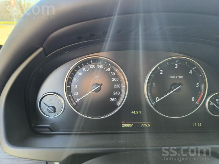 Black BMW X5 2015 in Riga, with an engine capacity of 3.00 L and mileage of 201 thousand km for 17500 €, photo 10 on AUTOMOTO.COM.LV