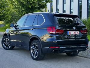 Black BMW X5 2015 in Riga, with an engine capacity of 2.00 L and mileage of 239 thousand km for 16800 €, photo 5 on AUTOMOTO.COM.LV