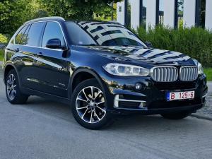 Black BMW X5 2015 in Riga, with an engine capacity of 2.00 L and mileage of 239 thousand km for 16800 €, photo 8 on AUTOMOTO.COM.LV