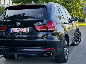 Black BMW X5 2015 in Riga, with an engine capacity of 2.00 L and mileage of 239 thousand km for 16800 €, photo 9 on AUTOMOTO.COM.LV