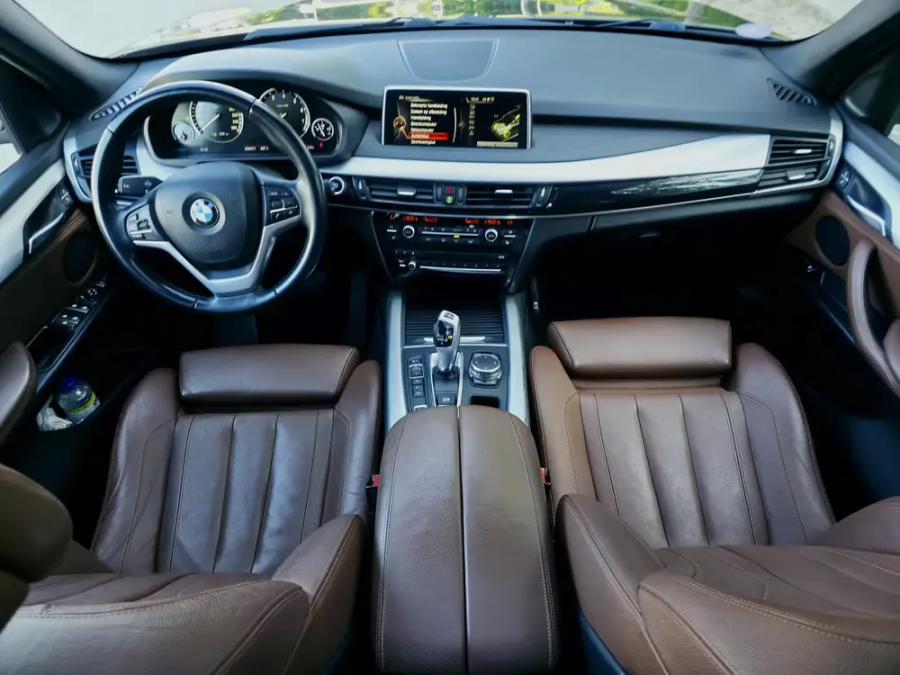 Black BMW X5 2015 in Riga, with an engine capacity of 2.00 L and mileage of 239 thousand km for 16800 €, photo 26 on AUTOMOTO.COM.LV