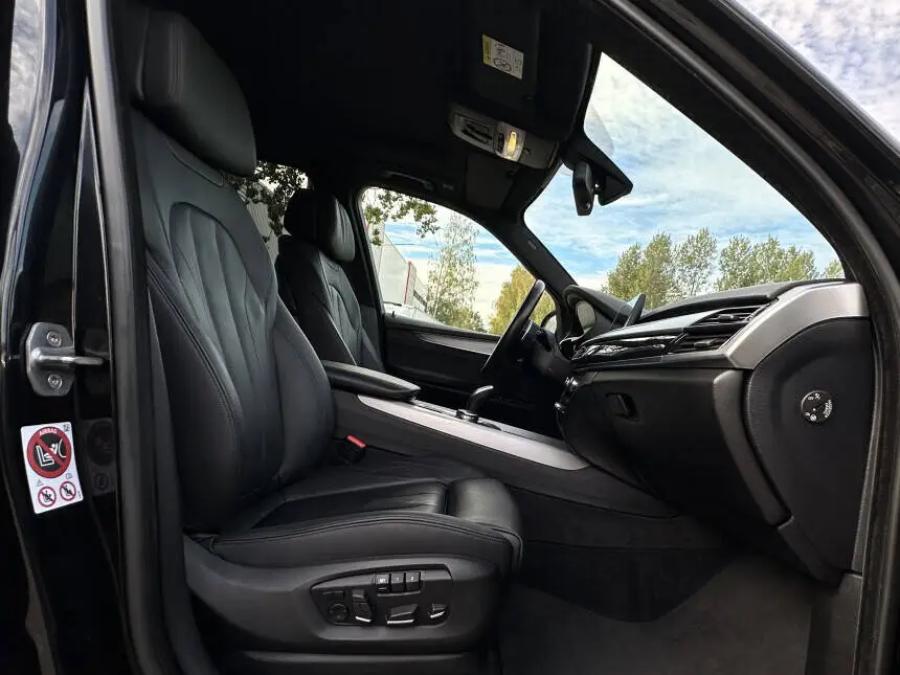 Black BMW X5 2015 in Riga, with an engine capacity of 3.00 L and mileage of 238 thousand km for 26490 €, photo 7 on AUTOMOTO.COM.LV