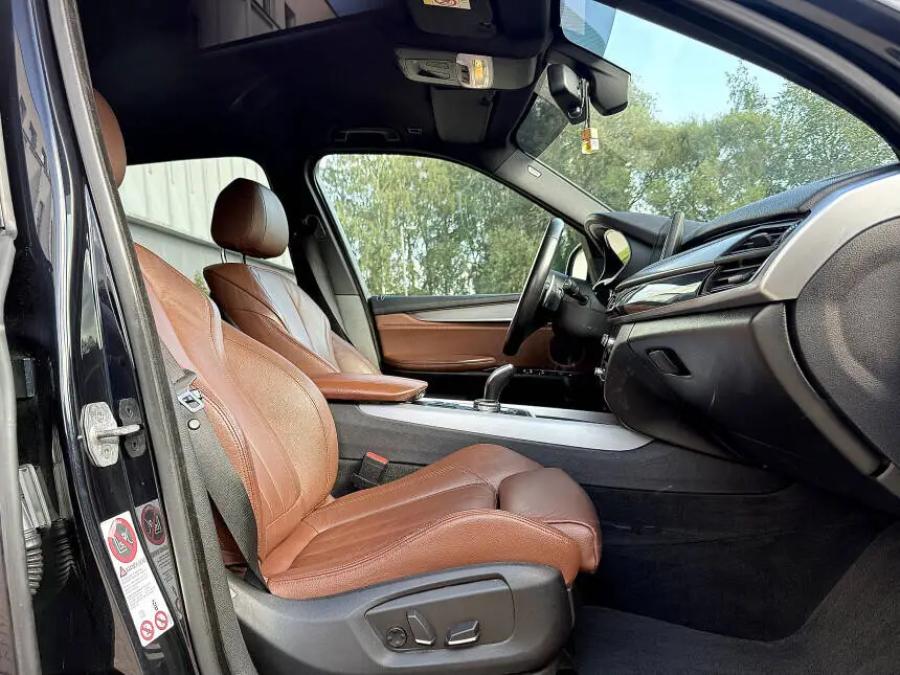 Black BMW X5 2015 in Riga, with an engine capacity of 3.00 L and mileage of 201 thousand km for 23000 €, photo 8 on AUTOMOTO.COM.LV