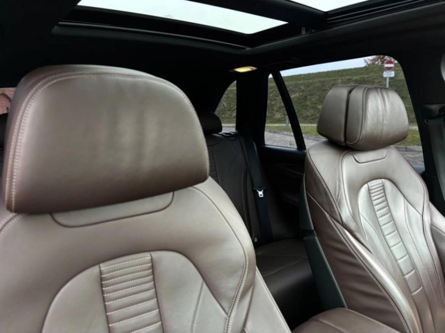 Black BMW X5 2015 in Riga, with an engine capacity of 3.00 L and mileage of 210 thousand km for 32950 €, photo 5 on AUTOMOTO.COM.LV