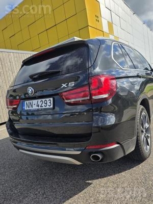 Black BMW X5 2015 in Riga, with an engine capacity of 3.00 L and mileage of 168 thousand km for 21199 €, photo 3 on AUTOMOTO.COM.LV