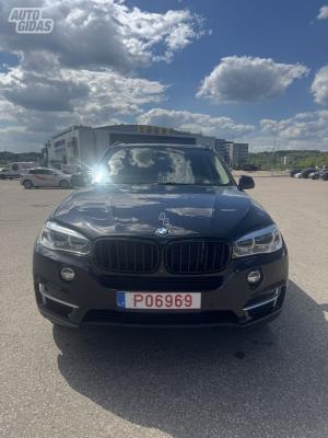 Black BMW X5 2015 in Vilnius, with an engine capacity of 3.00 L and mileage of 300 thousand km for 13700 €, photo  on AUTOMOTO.COM.LV