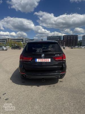 Black BMW X5 2015 in Vilnius, with an engine capacity of 3.00 L and mileage of 300 thousand km for 13700 €, photo 6 on AUTOMOTO.COM.LV
