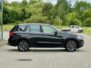 Black BMW X5 2015 in Vilnius, with an engine capacity of 2.00 L and mileage of 199 thousand km for 13500 €, photo 6 on AUTOMOTO.COM.LV