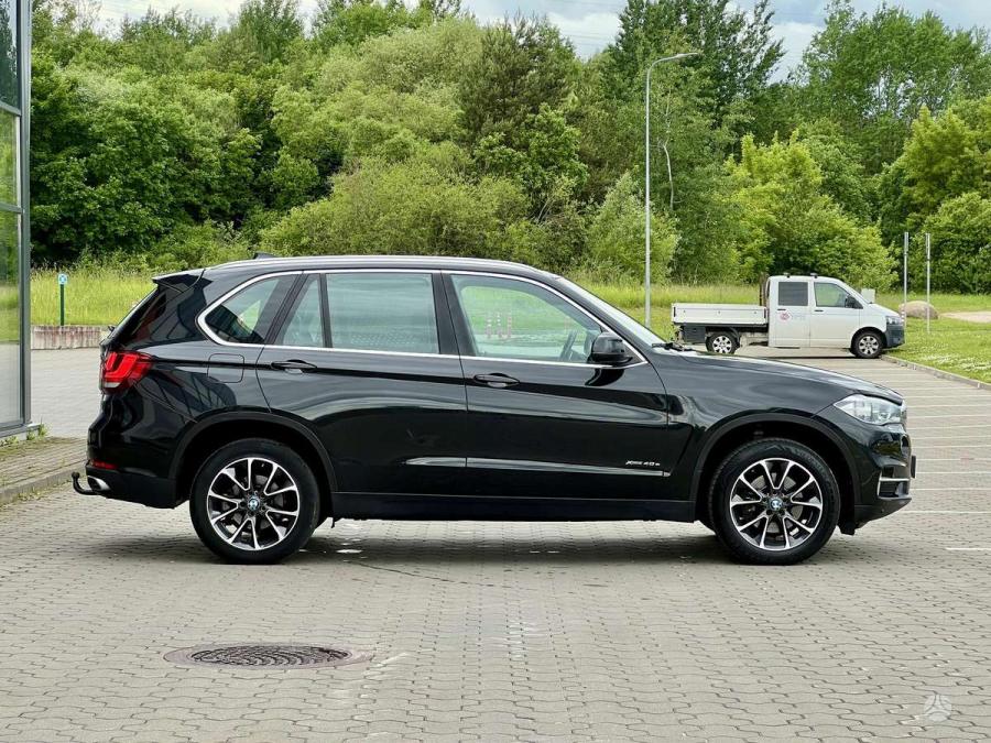 Black BMW X5 2015 in Vilnius, with an engine capacity of 2.00 L and mileage of 199 thousand km for 13500 €, photo 6 on AUTOMOTO.COM.LV