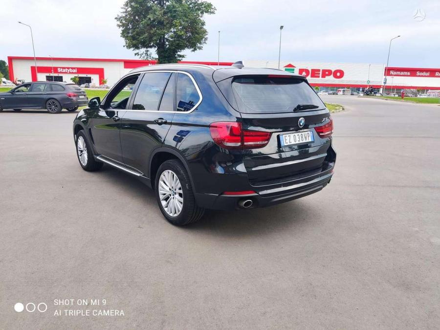 Black BMW X5 2015 in Panevezys, with an engine capacity of 2.00 L and mileage of 273 thousand km for 14900 €, photo 6 on AUTOMOTO.COM.LV